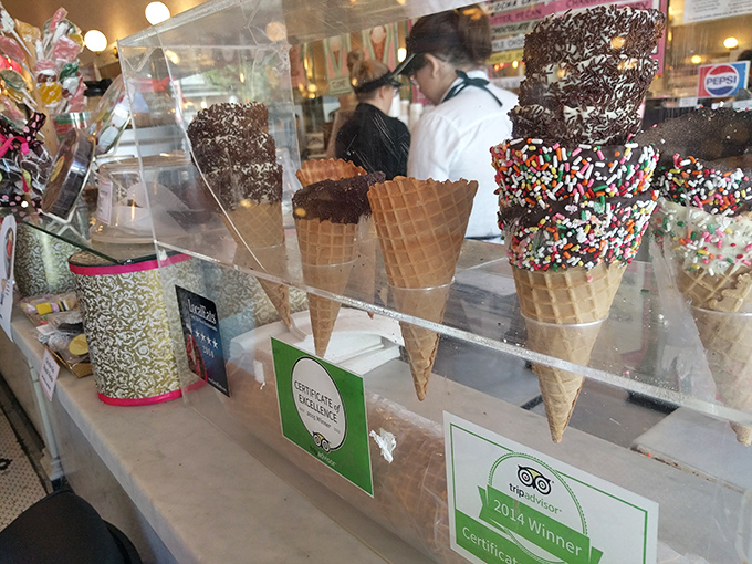 Dipped cones standing at attention like delicious soldiers, their chocolate armor protecting the creamy goodness within until that first satisfying bite.
