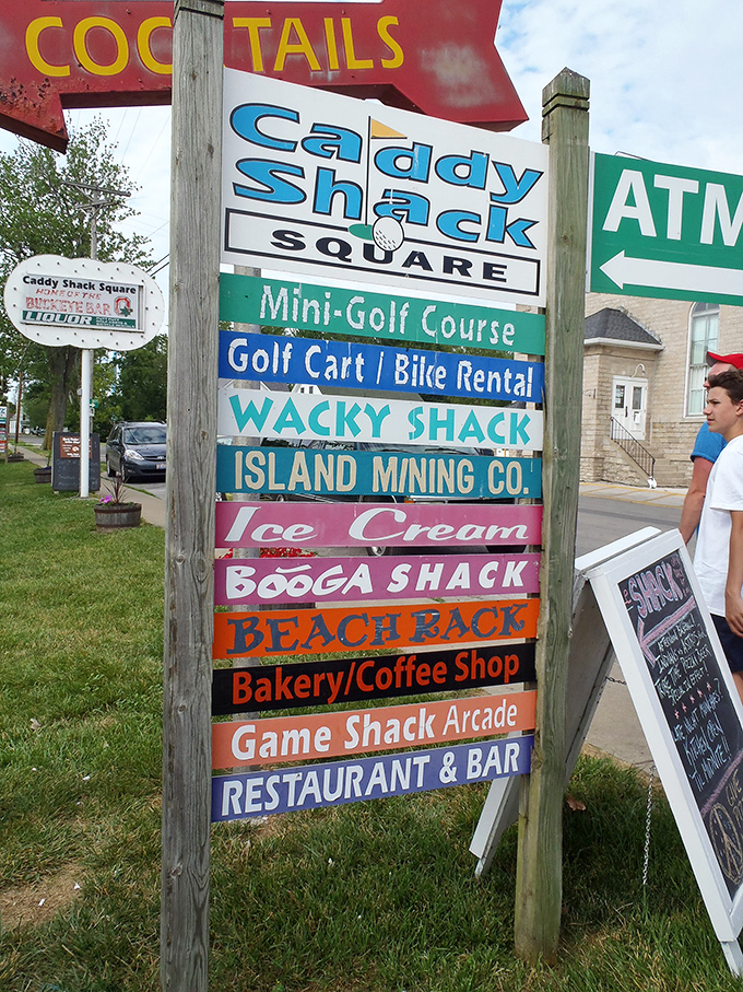 Caddy Shack Square's colorful sign promises island diversions from mini-golf to ice cream &ndash; vacation essentials all in one spot.