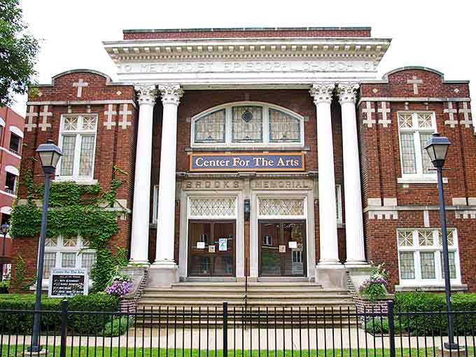 The former Methodist Episcopal Church now serves as Marshall's Center for the Arts, its grand columns and stained glass windows framing cultural experiences instead of sermons.