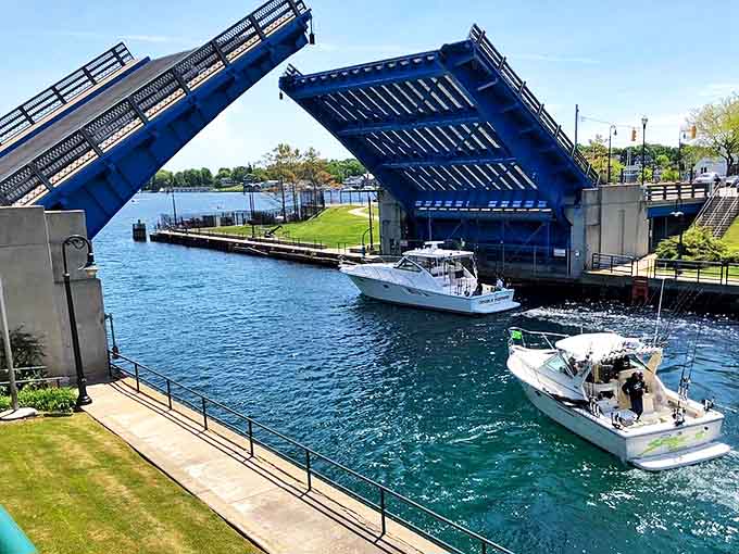 The rhythmic dance of Charlevoix's drawbridge, where boats take priority and everyone learns the art of patient waiting.