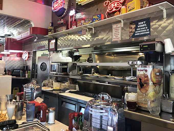 Behind the scenes, the kitchen gleams with chrome and efficiency, where classic diner magic happens every single day.