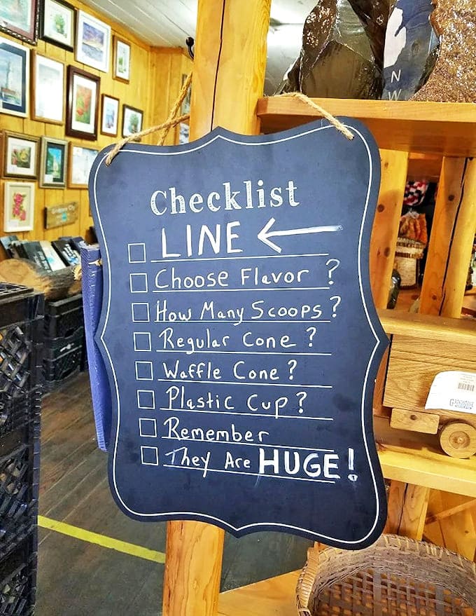 The checklist sign offers helpful guidance for ordering, with the final reminder that these scoops are HUGE serving as both warning and promise.