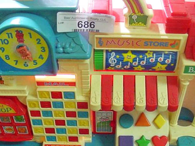 Before screens dominated playtime, these colorful activity centers taught generations of children about shapes, sounds, and simple mechanical joy.
