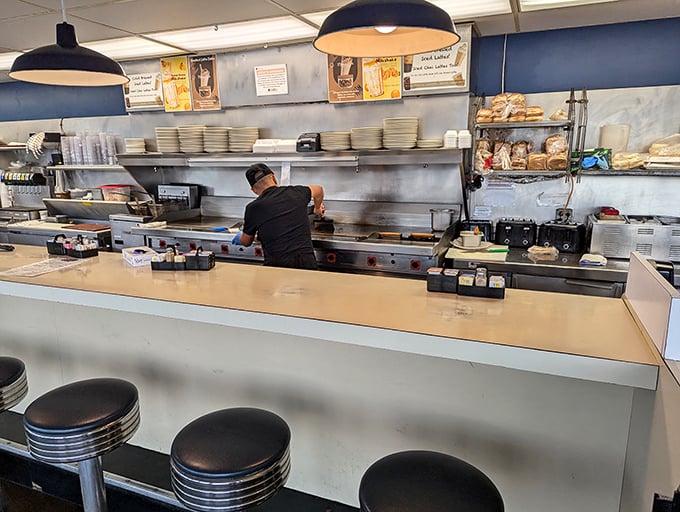 Where solo diners can enjoy front-row seats to the culinary choreography happening on the other side.