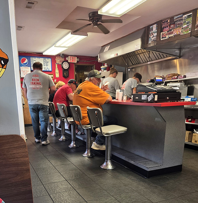 The counter seating offers front-row tickets to the best show in town &ndash; watching grill masters work their magic with practiced precision.