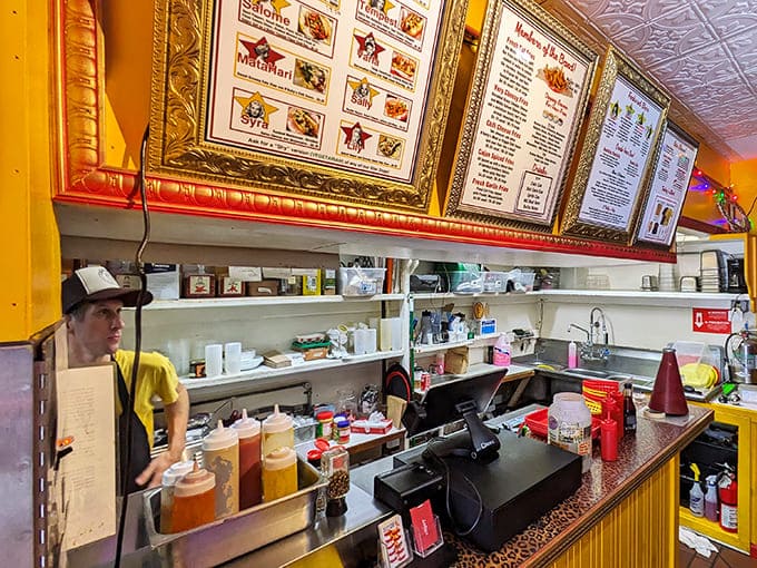 The counter &ndash; where hot dog dreams come true and museum artifacts watch approvingly from their gold-framed perches.