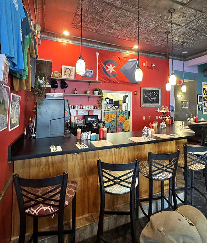 The counter seating offers front-row views of the kitchen magic, where those famous Cajun home fries sizzle to golden perfection.