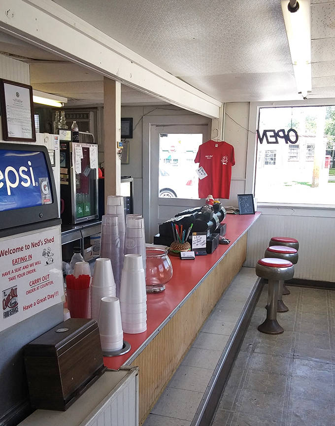 The counter where magic happens &ndash; simple, efficient, and staffed by folks who know your order before you say it if you're a regular.