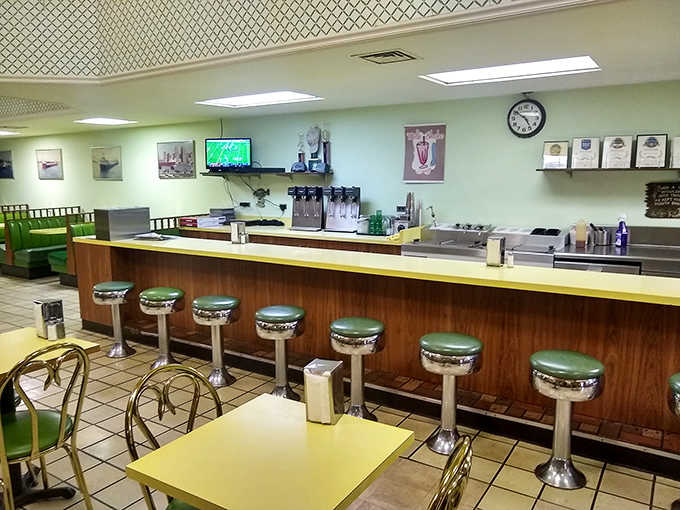 The counter seating offers front-row views to short-order magic, where seasoned cooks transform simple ingredients into comfort food masterpieces.