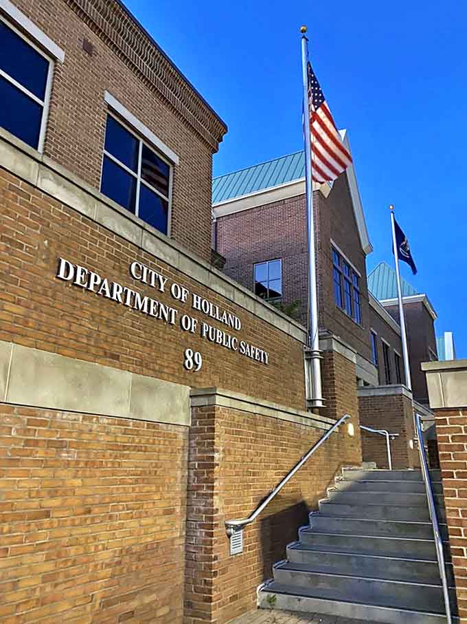 Even municipal buildings in Holland look like they belong on a heritage tour &ndash; brick, flags, and that unmistakable Midwestern civic pride.