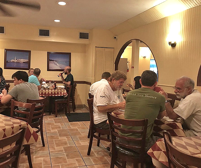 Where food brings people together &ndash; conversations flow as freely as the sangria in this wood-paneled haven.