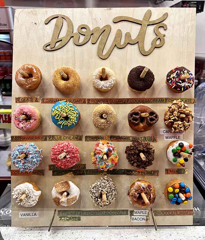 A wooden display board showcasing the mini masterpieces like tiny edible works of art in a delicious museum.