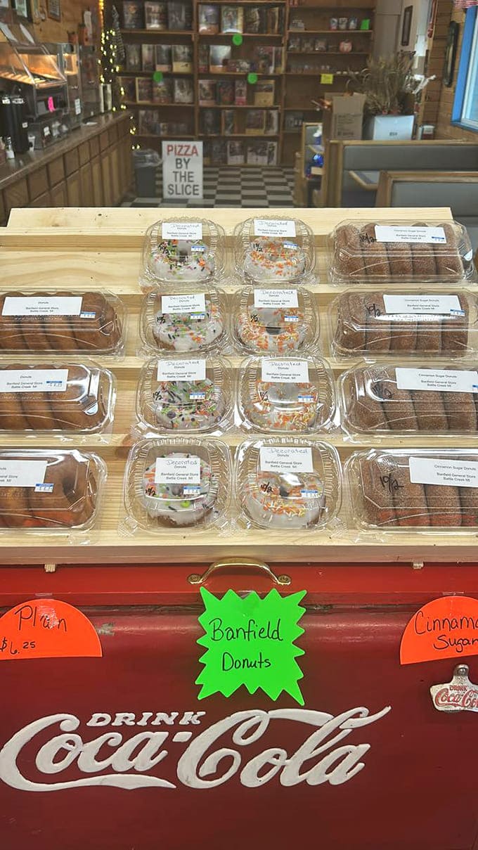 Fresh Banfield donuts lined up like sugary soldiers, ready to make your morning infinitely better or your afternoon significantly sweeter.