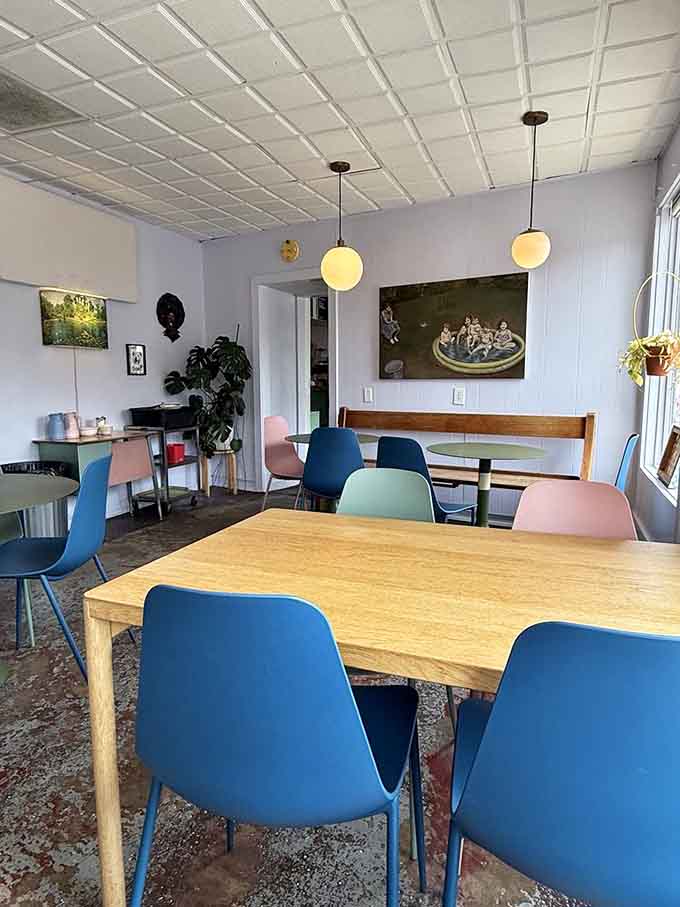 Mismatched furniture and warm lighting create the kind of space where you want to linger over coffee.