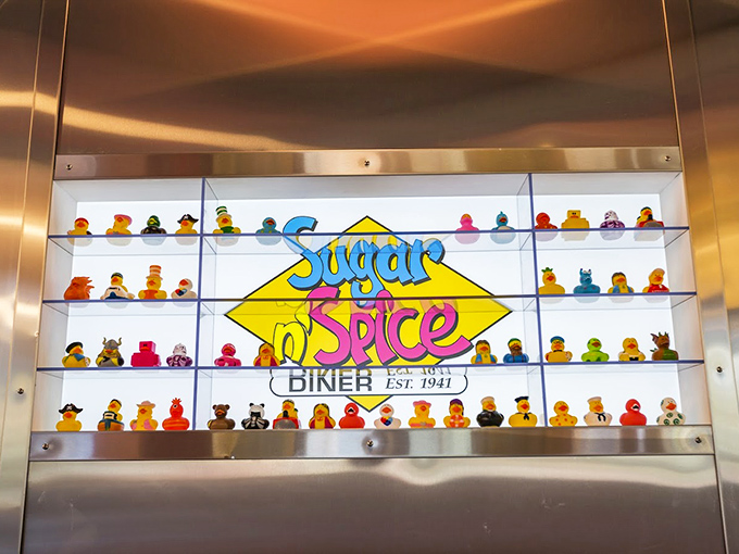 Duck Display: The whimsical rubber duck collection &ndash; Sugar n' Spice's unofficial mascot army &ndash; stands guard over diners from their illuminated display case.