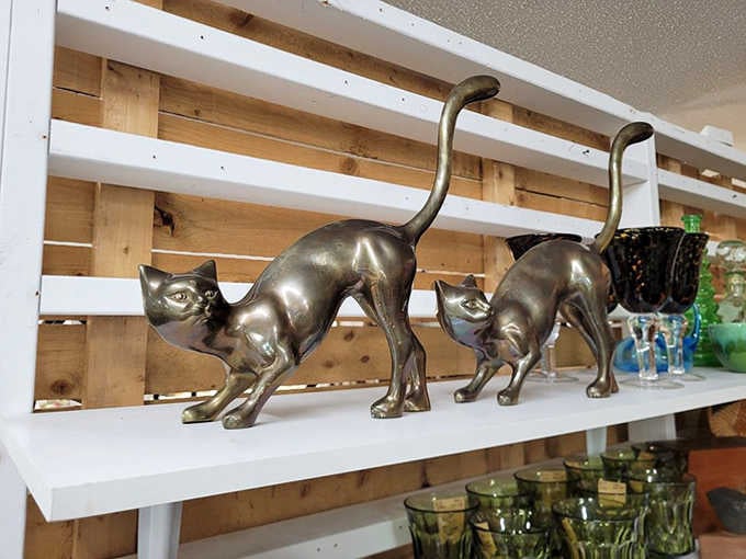 These sleek metal cat sculptures exemplify the mid-century modern aesthetic that's become increasingly sought-after by younger collectors.