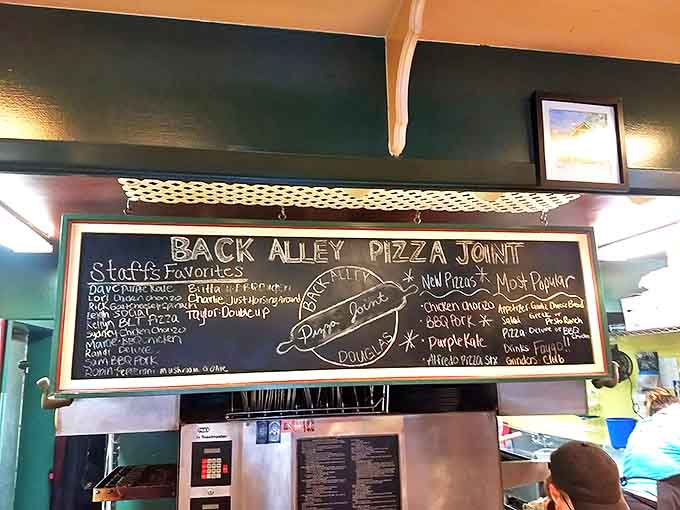 The staff favorites board reads like a love letter to regular customers, with specialty pizzas named after local characters and inside jokes.