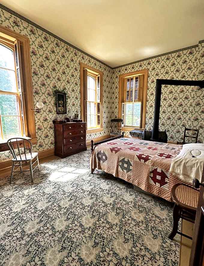 Patterns on patterns on patterns &ndash; this bedroom embraces the Victorian horror of empty space with wallpaper and textiles that practically vibrate with busy charm.