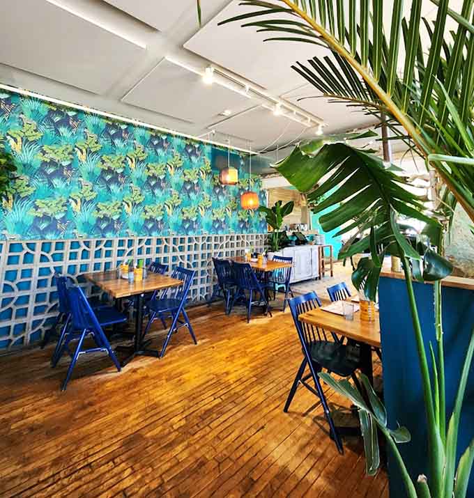 Another angle reveals more tropical greenery and vibrant design, because one view can't capture all this restaurant's personality and charm.