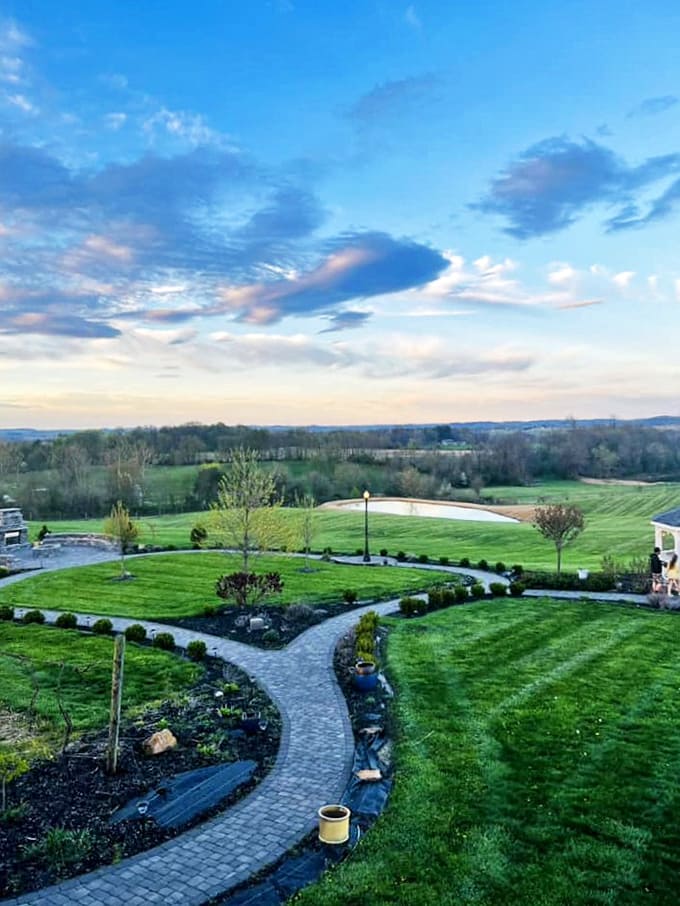 Rolling hills stretch toward the horizon beyond Kingston, creating a landscape that invites deep breaths and slower heartbeats.