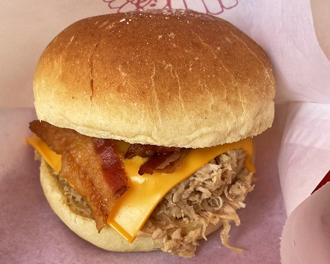 A bacon cheeseburger that doesn't need fancy toppings to impress – just quality ingredients and decades of know-how.