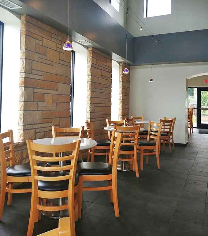 High ceilings and natural light create an airy escape where ice cream contemplation is elevated to an art form.