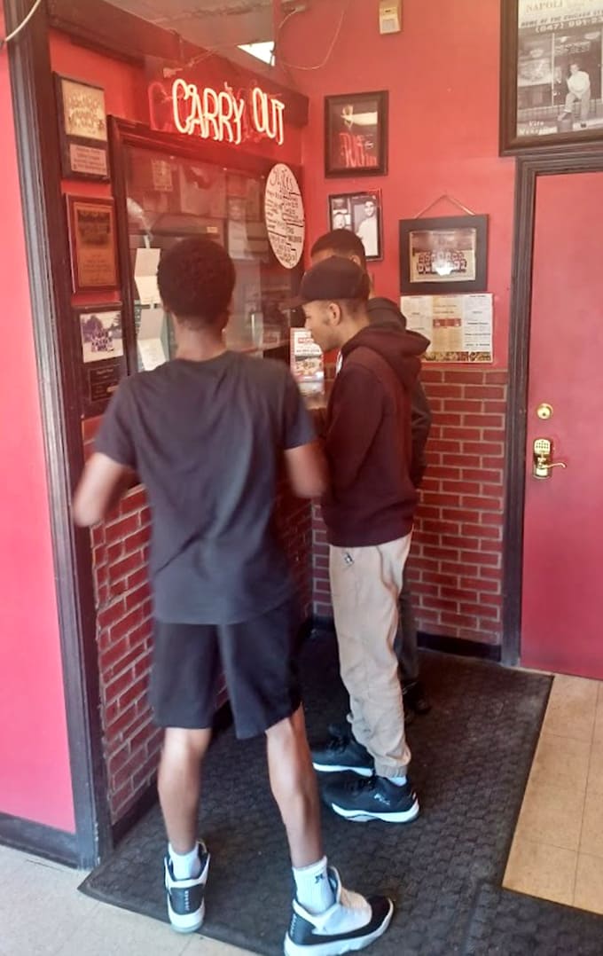 The carry-out window where pizza dreams come true and dinner plans get infinitely better in seconds.