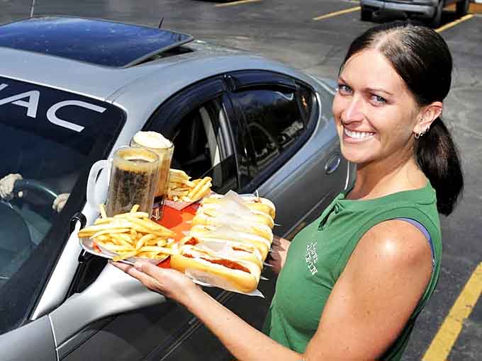 Car hop service brings food directly to your vehicle &ndash; a charming throwback that transforms ordinary takeout into a delightful dining experience.