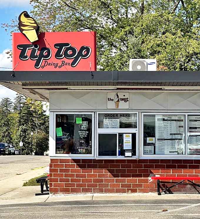 The daytime ordering window welcomes customers with a sign proudly declaring "Serving Osakis Since 1955."