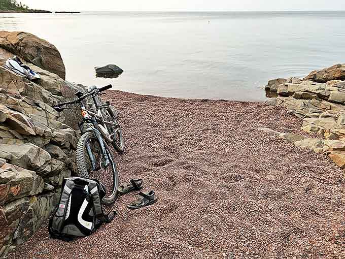 Parked Bike: The perfect parking spot doesn't exi&mdash; Oh wait, there it is: between ancient rocks with Lake Superior's waters as your welcome committee.