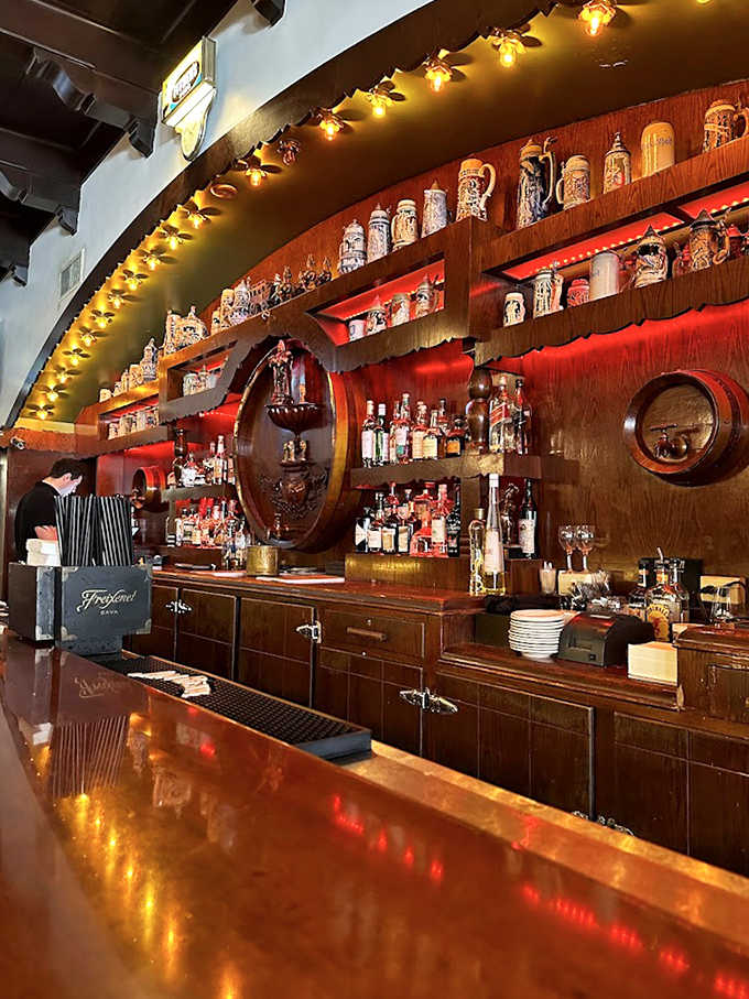 The bar isn't just where drinks are served &ndash; it's a museum of memories with vintage steins watching over cocktails crafted with decades of expertise.