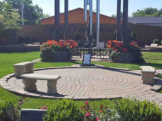 Take a moment to rest on these stone benches and let the occasional wind-driven melody provide the soundtrack to your visit.