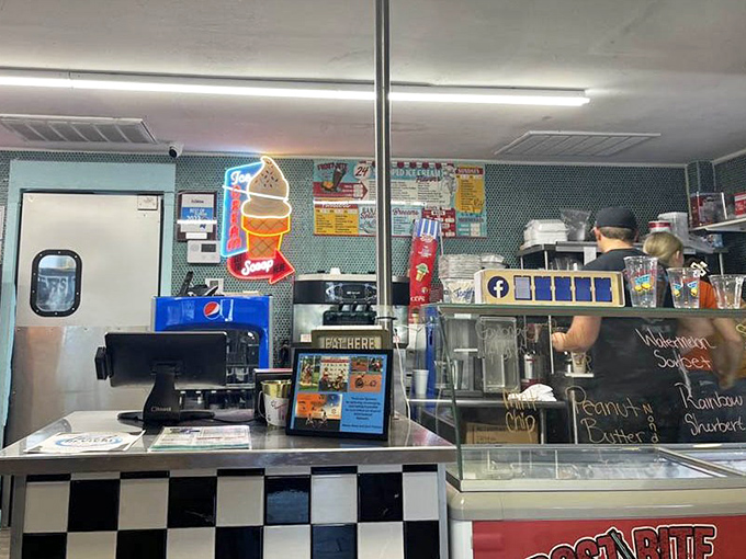 The service counter's black and white checkerboard pattern isn't just decoration &ndash; it's a starting line for your taste buds' victory lap.