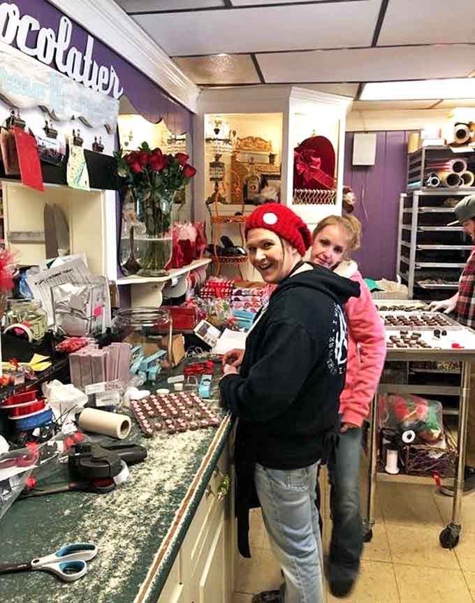 Behind the scenes, skilled hands craft each chocolate masterpiece with the precision and care of true artisans.