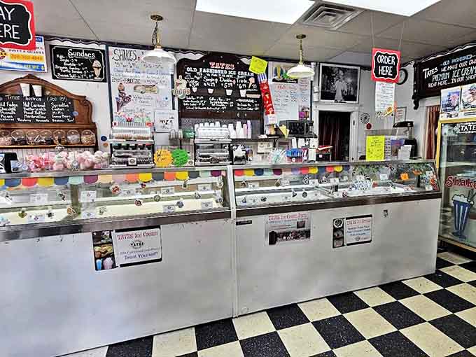 The counter area buzzes with anticipation as scoops fly and toppings cascade &ndash; a choreographed dance of dessert creation that never gets old.