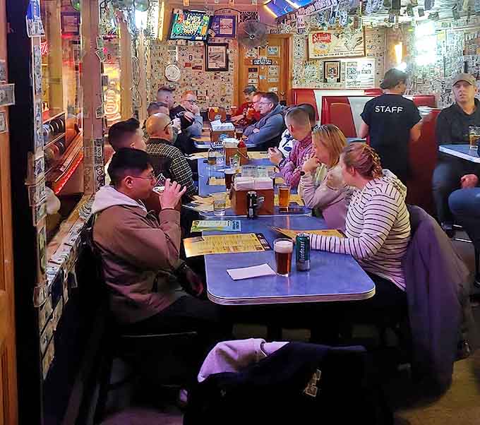 Where strangers become friends over shared burger bliss, united by the universal language of "mmm" and "pass the napkins."