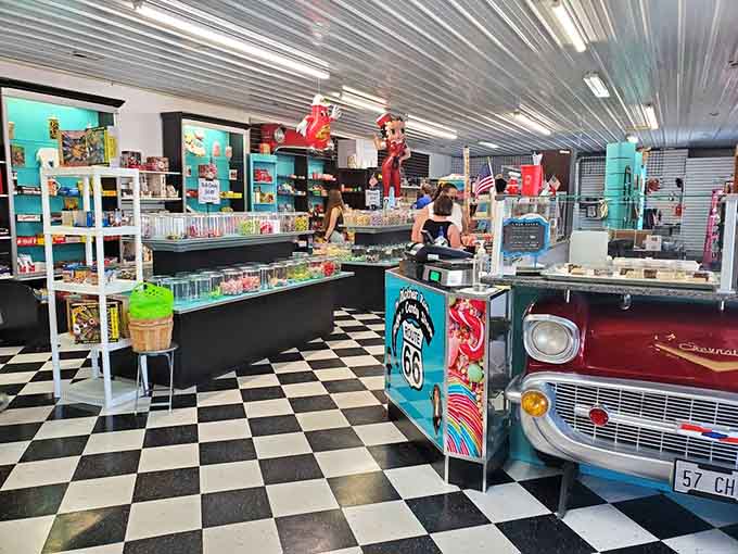 The counter area gleams with retro charm, where chrome stools and vintage decor create the perfect spot for solo diners and conversation starters.