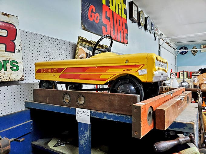 This vintage pedal car would make any kid from the 1950s squeal with delight. Childhood dreams preserved in bright yellow metal!
