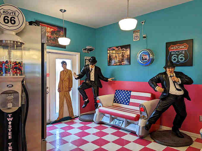The waiting area features life-sized Blues Brothers figures and classic car seating – proving that at Twistee Treat, even waiting for a table is an experience worth having.