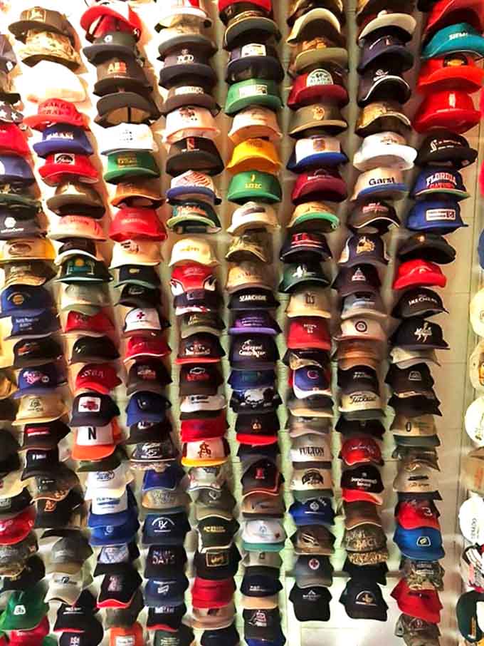 Every available inch holds history—team logos, company brands, and promotional campaigns preserved in fabric and stitching.