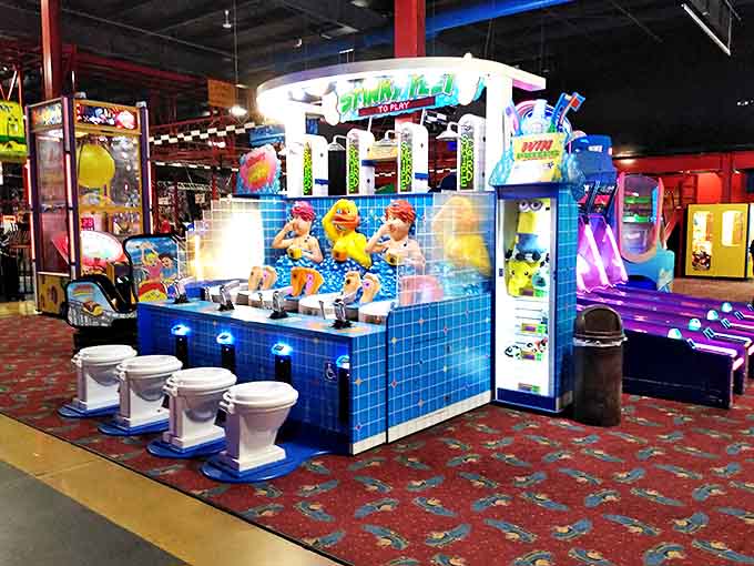 Toilet humor meets carnival skill at this quirky water-shooting gallery where bathroom fixtures become unlikely game controllers.