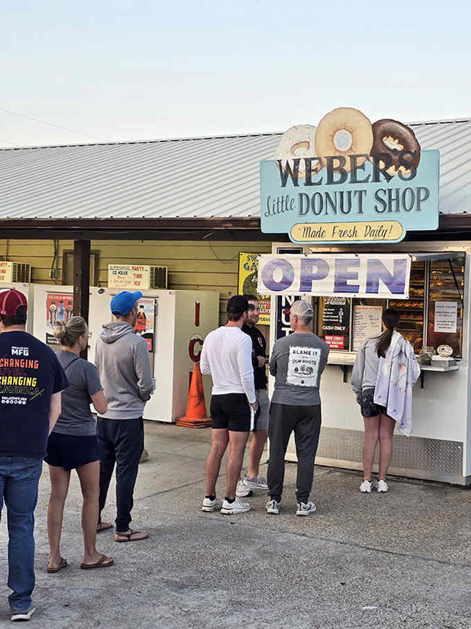 The morning pilgrimage begins&mdash;vacation warriors line up for their sweet reward, creating an impromptu community united by donut devotion.