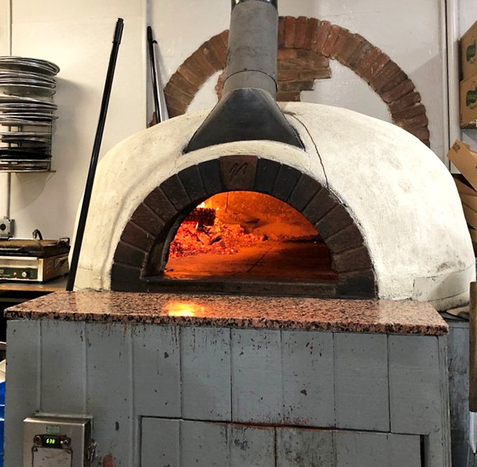 The heart and soul of The Pizza Joint &ndash; where 800+ degrees transforms simple ingredients into transcendent pizza.