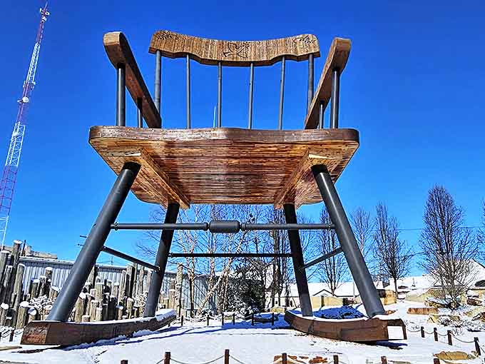 Winter snow creates a striking contrast, making the warm wood tones pop while adding a peaceful quality to the scene.
