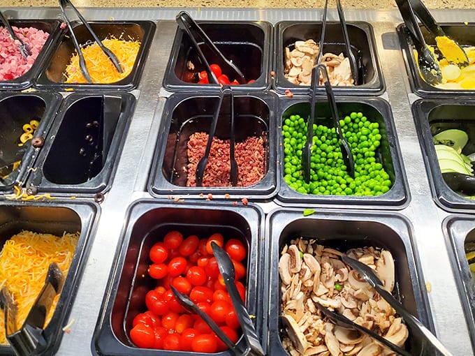 The salad bar offers fresh vegetables and countless toppings, though many diners skip straight to the main event and desserts instead.