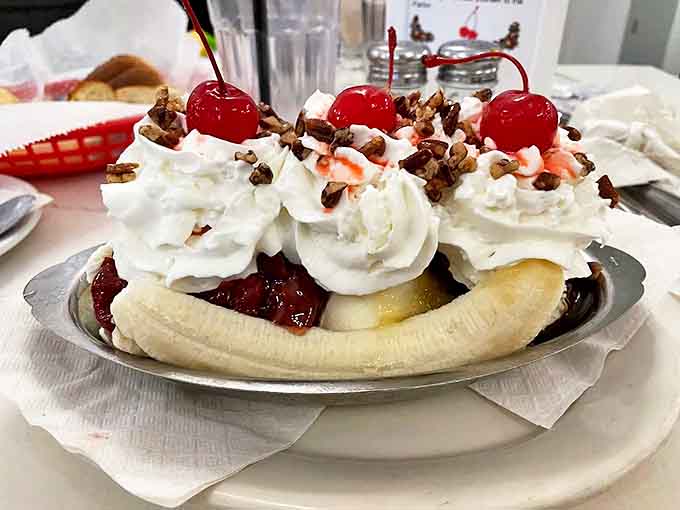 The banana split arrives like royalty – a mountain of ice cream, fruit, and toppings that makes adults giggle and children's eyes grow wide.