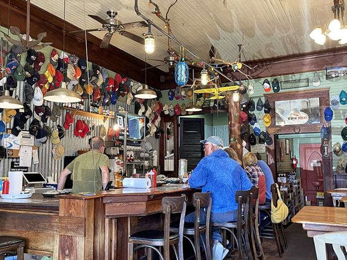 The bar area buzzes with activity as staff shuck oysters with the precision and speed that comes only from years of practice.