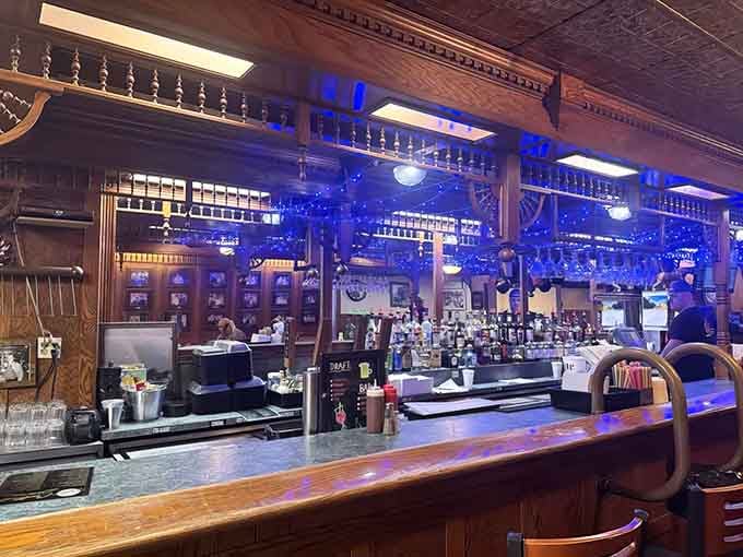 That classic bar setup has probably heard more steak-related stories than a cattle ranch, each one more enthusiastic than the last about the portions.