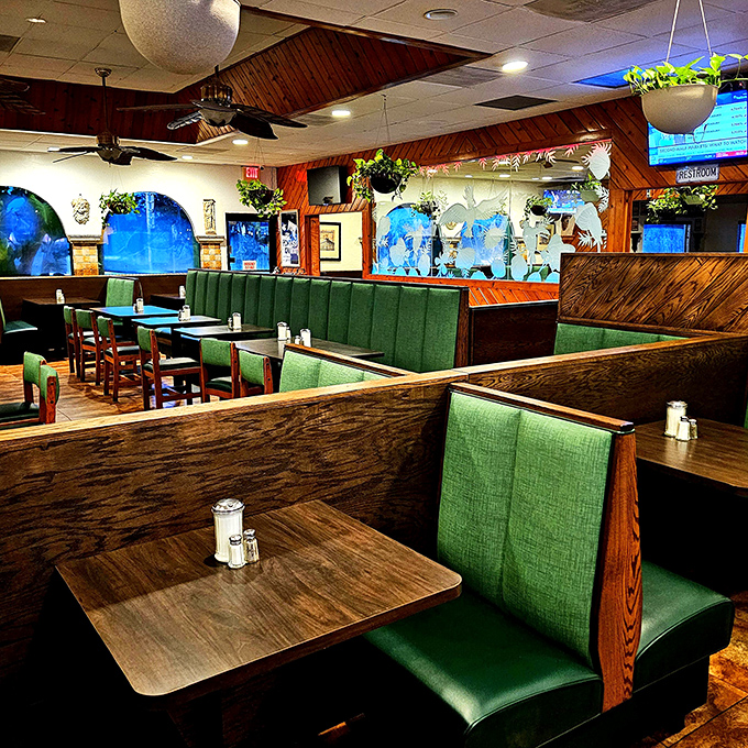 The booths create little islands of privacy in a sea of breakfast chatter&mdash;perfect for morning conspiracies or recovery from last night.