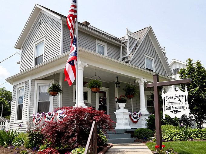 Neil Armstrong's boyhood home stands as a testament to humble beginnings, with its welcoming porch and patriotic decorations.